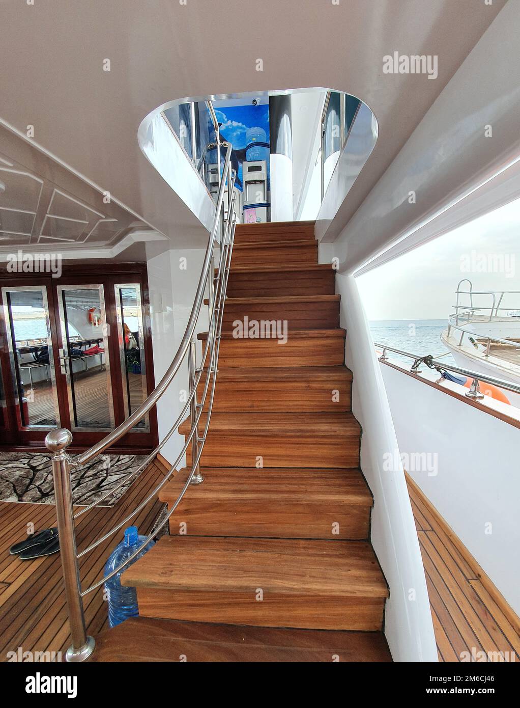 Indoor beautiful stainless steel staircase to the lower deck on a yacht ...