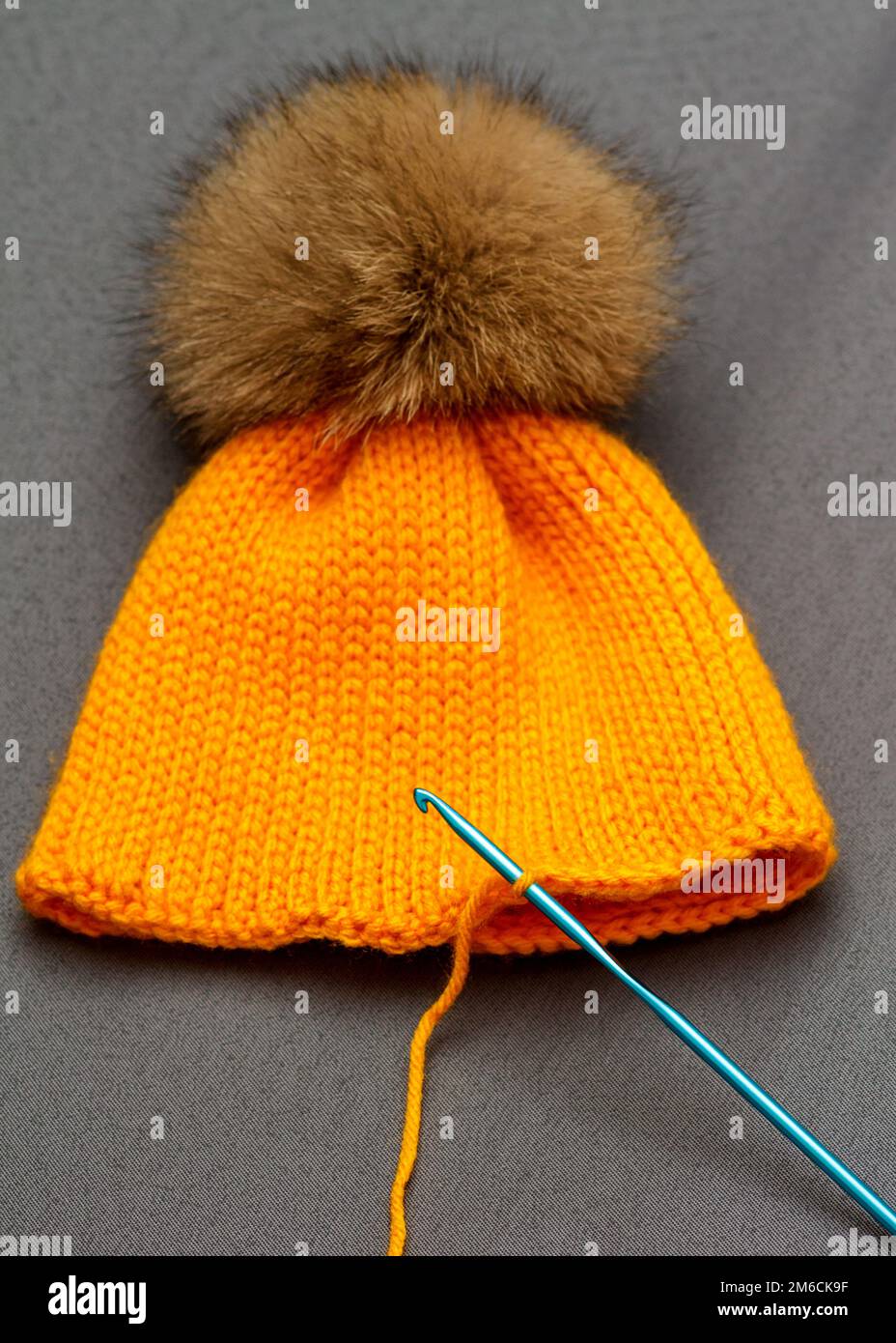 Orange hat cloth hi-res stock photography and images - Alamy
