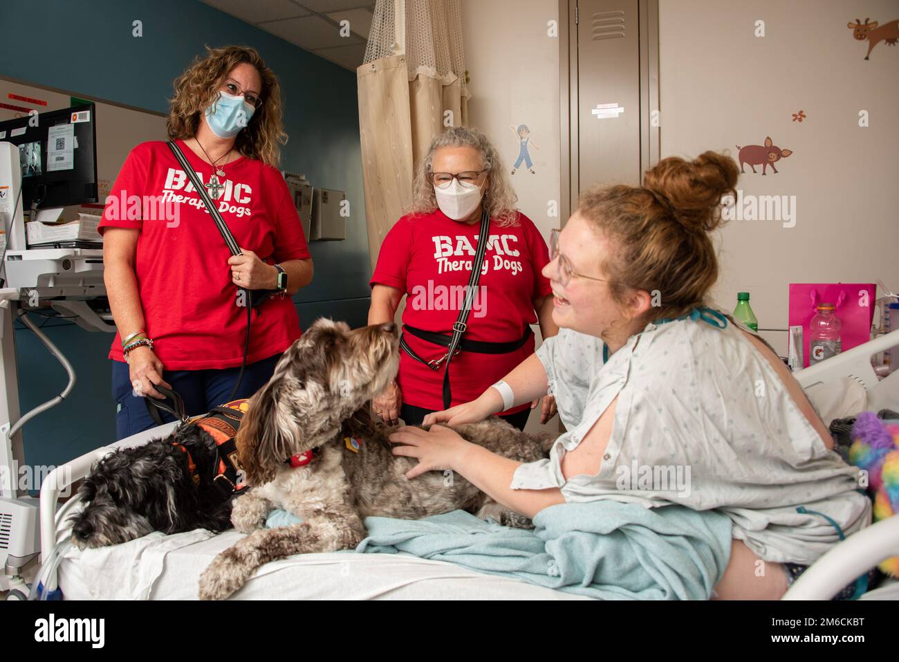 Volunteer therapy dog handlers, Kris Blair and Mellissa Carrigan, along ...