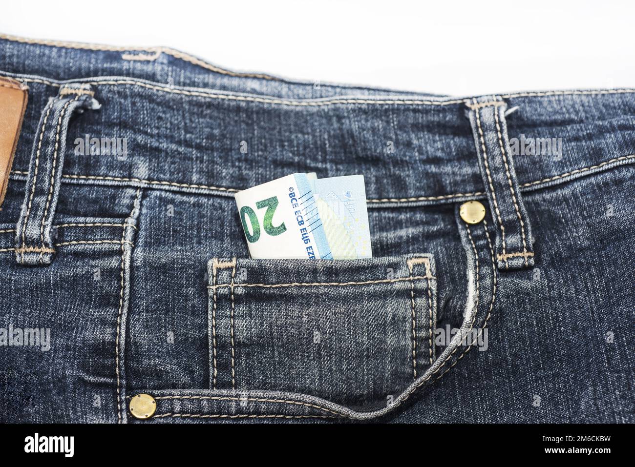 Euro banknotes in jeans Stock Photo - Alamy