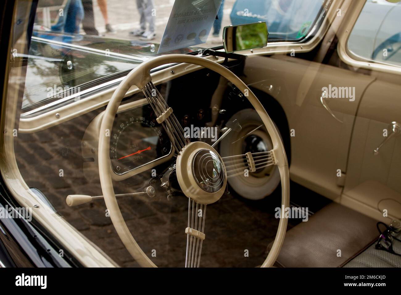 Classic car interior with close-up on steering wheel Stock Photo - Alamy