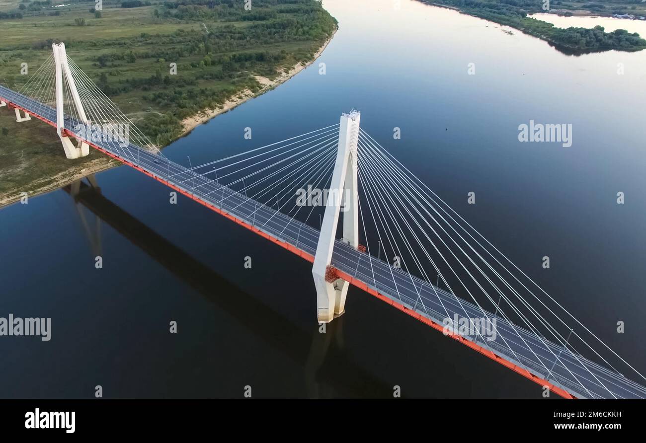 Beautiful bridge over the river. The bridge on the cables is road Stock ...