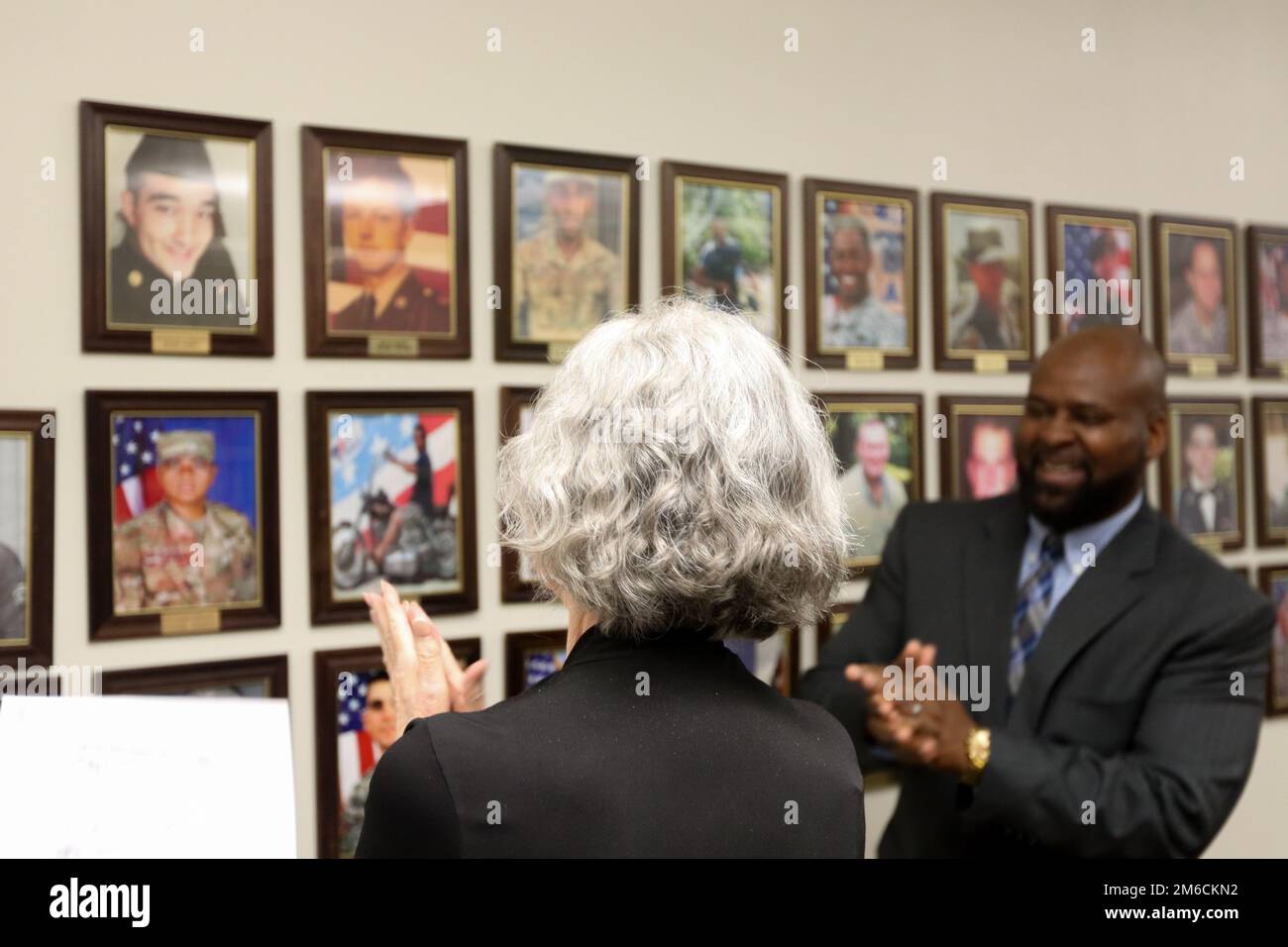 Elfriede Werdehoff and Keith Powers admire the picture of Master Sgt ...