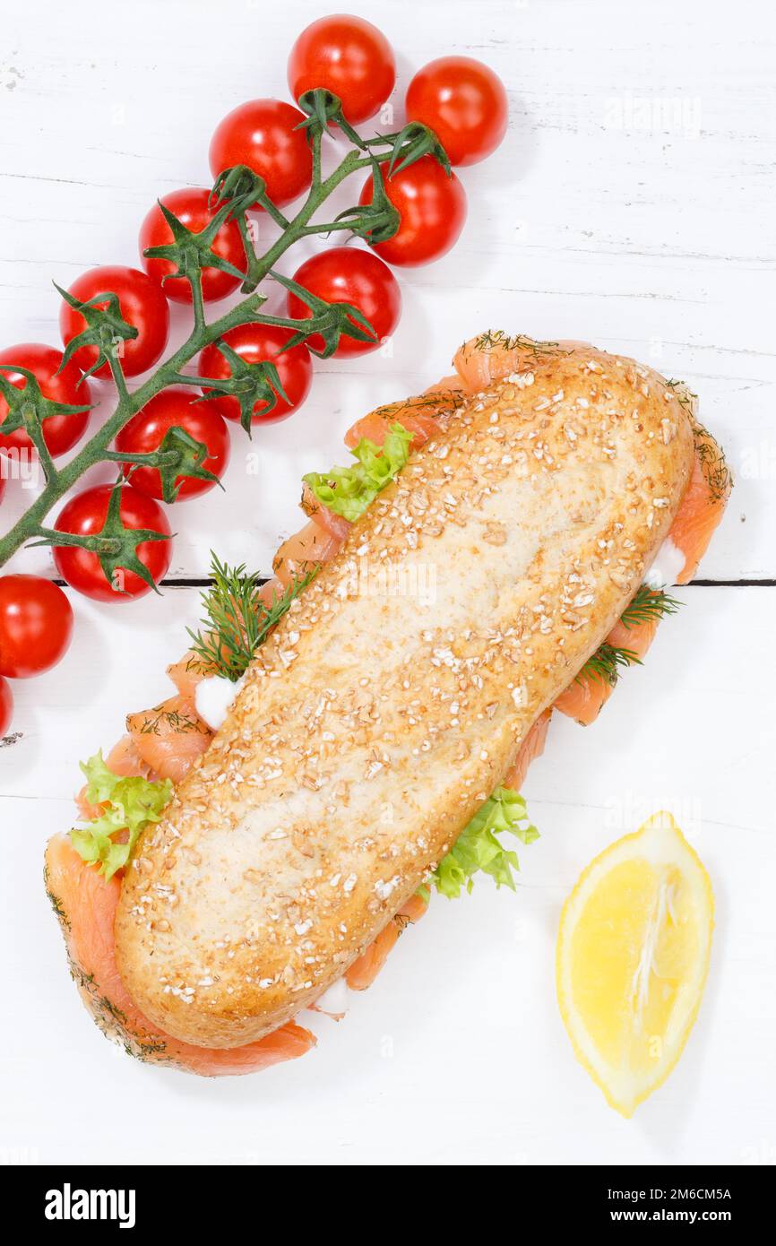 Sandwich baguette wholemeal roll topped with salmon fish portrait from ...