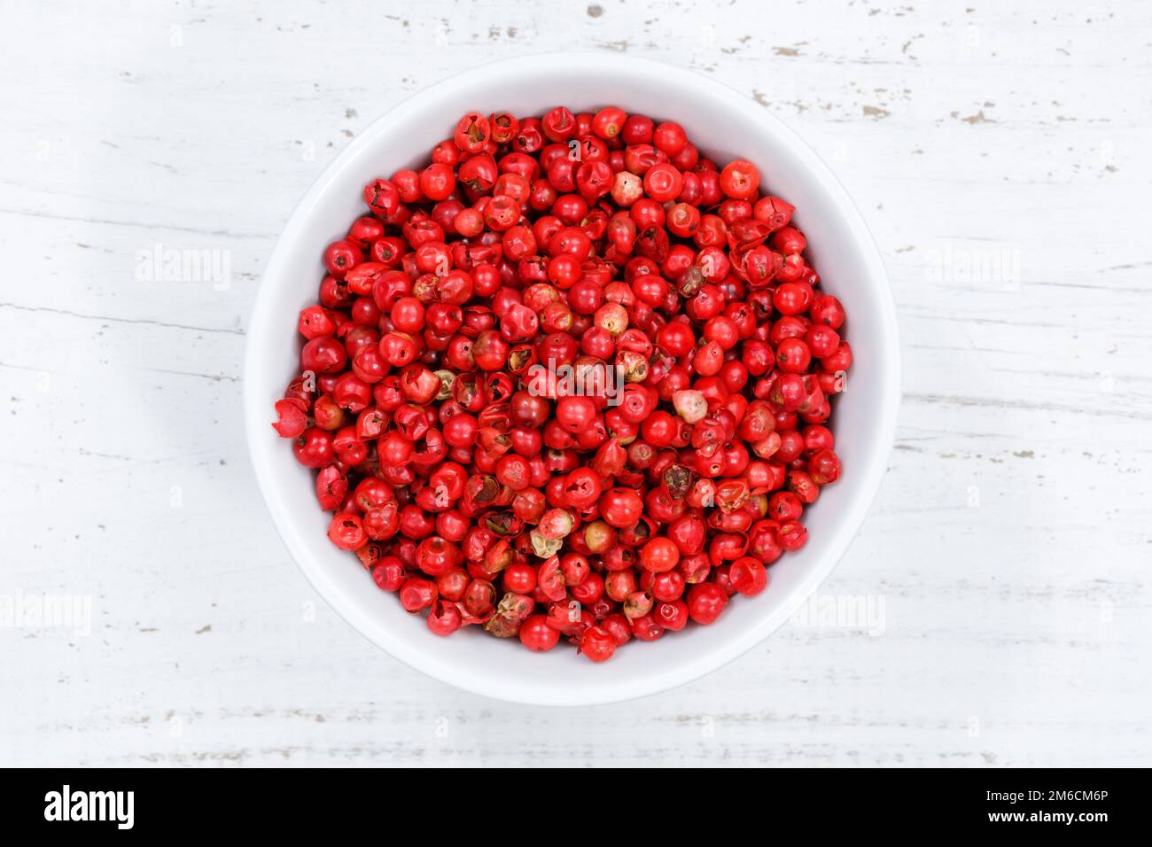 Red pepper grains red pepper grains from above wooden board Stock Photo ...