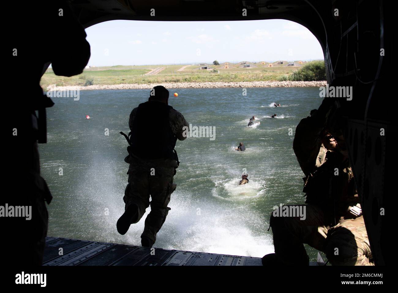 Enablers from 10th Special Forces Group (Airborne) conduct a helocast ...