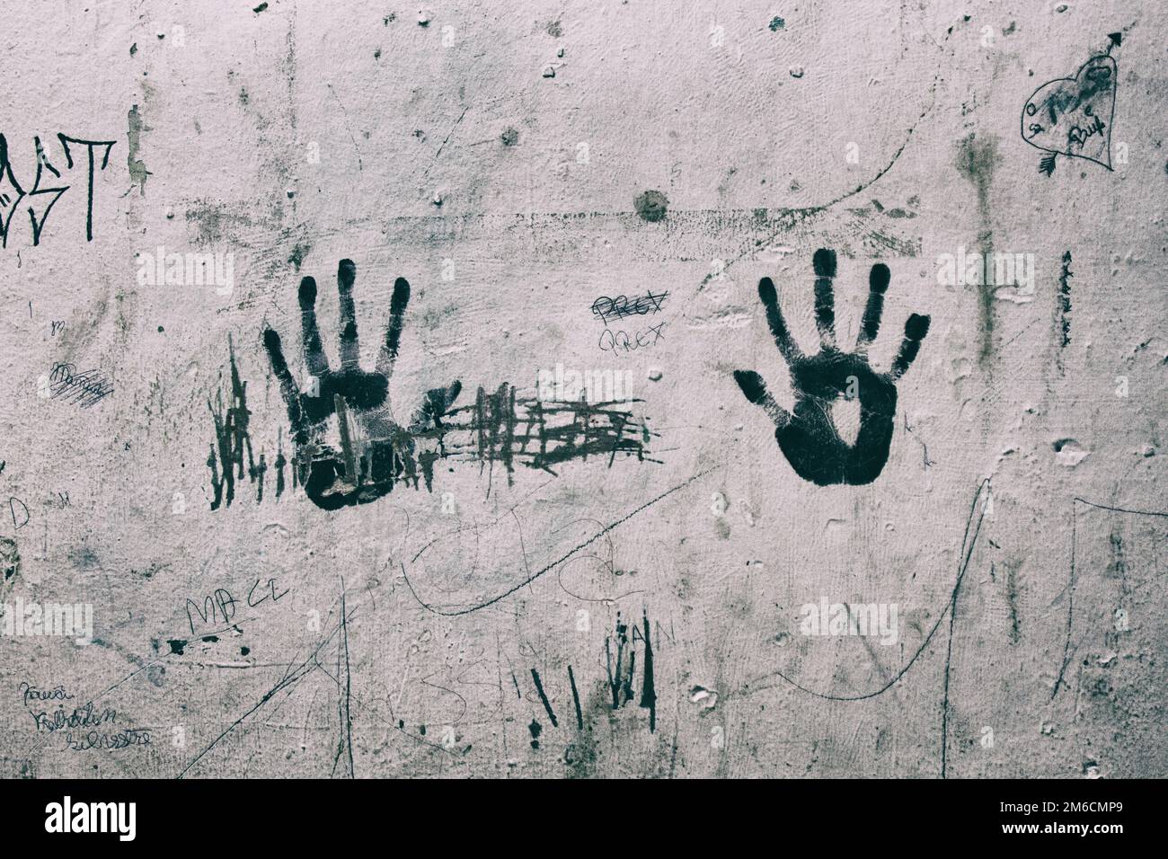 Right and Left hand print marks on a shabby wall Stock Photo - Alamy