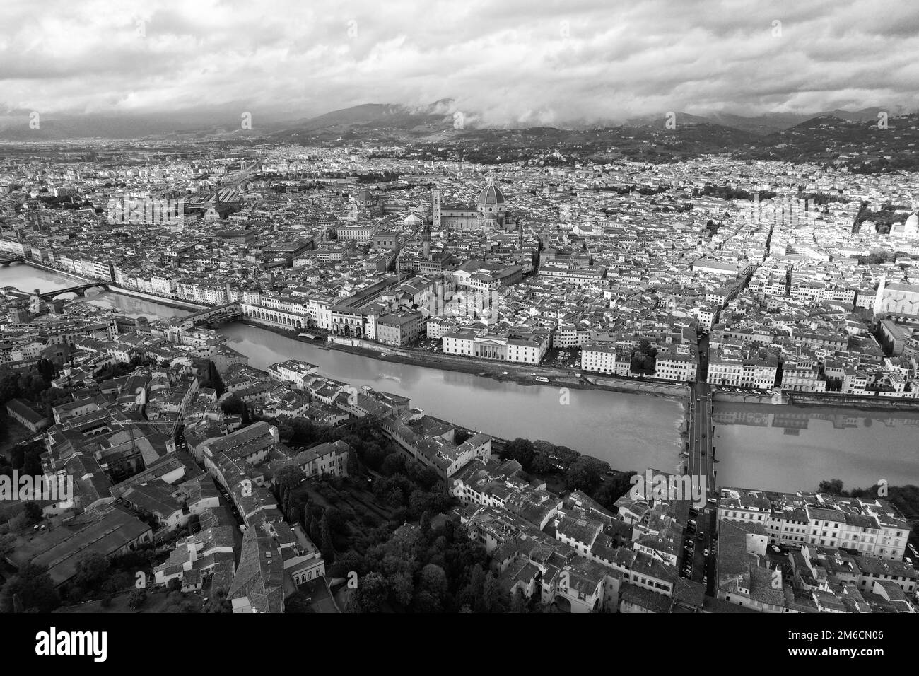 A grayscale bird's eye view of Lyon cityscape with the Rhone river and ...
