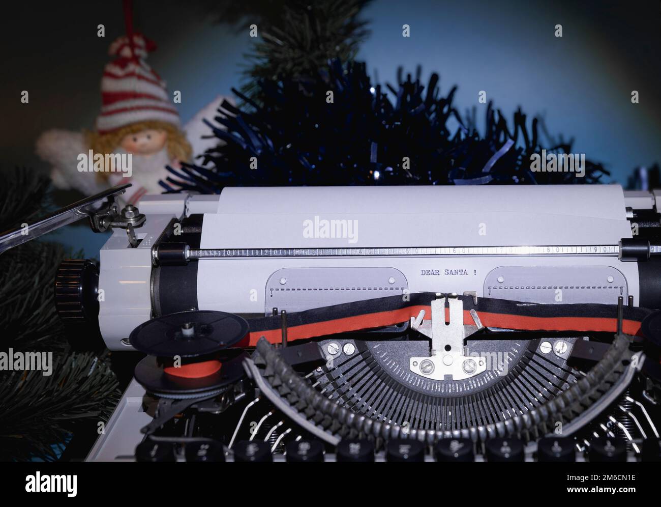 Dear Santa - writing the words Dear Santa with an old typewrite. Close ...