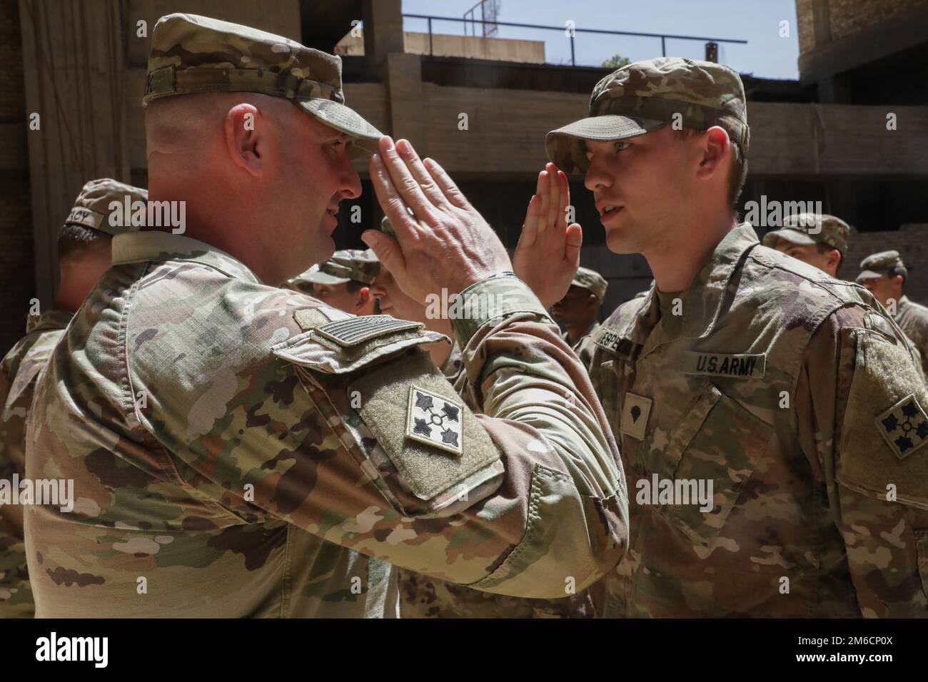 Lt. Col. Gregory Polk, the Task Force Pioneer commander, salutes a U.S ...