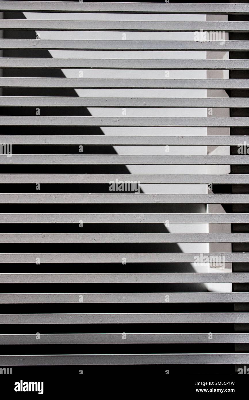 White metal bar gate Stock Photo - Alamy