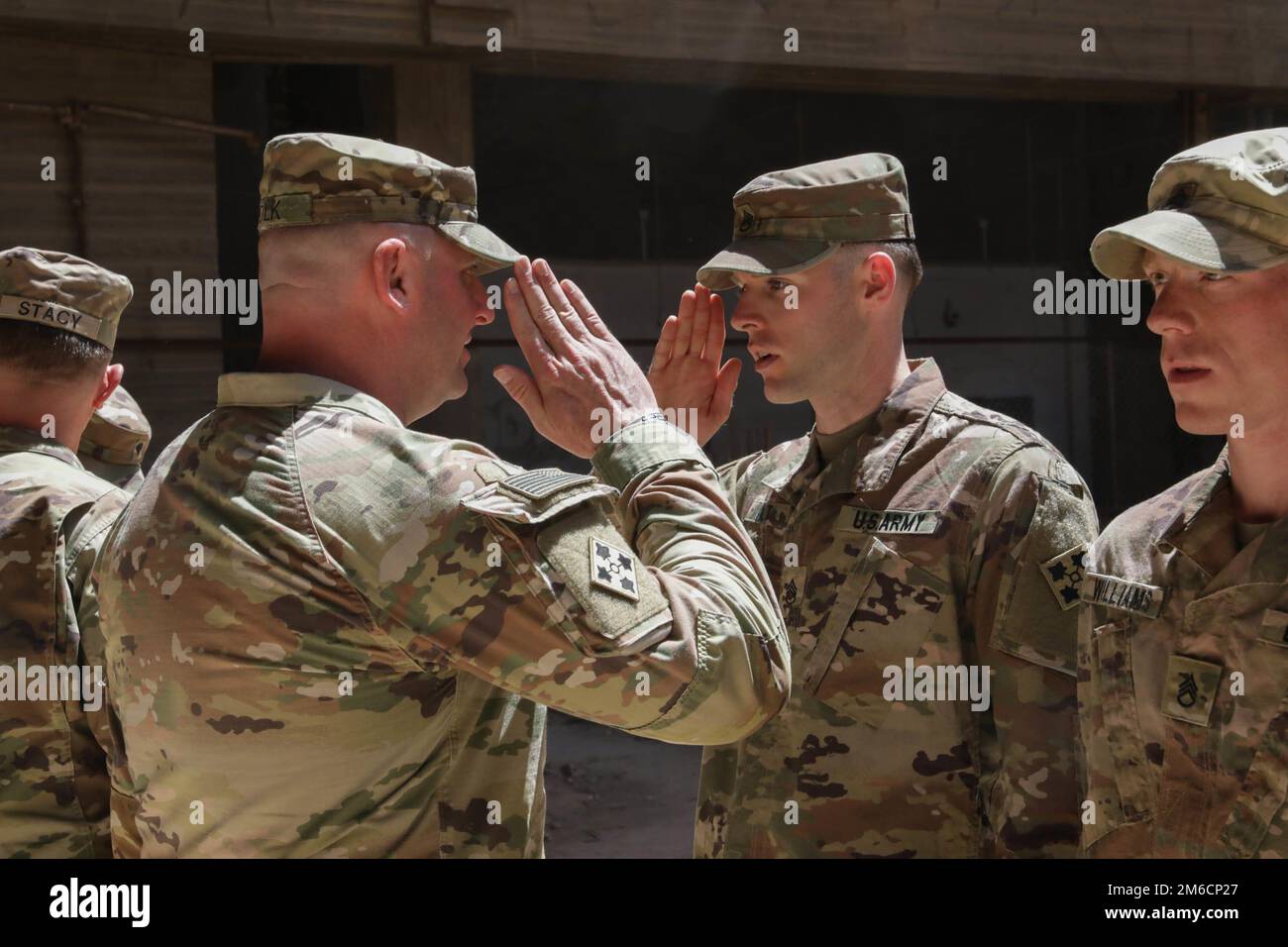 Lt. Col. Gregory Polk, the Task Force Pioneer commander, salutes a U.S ...