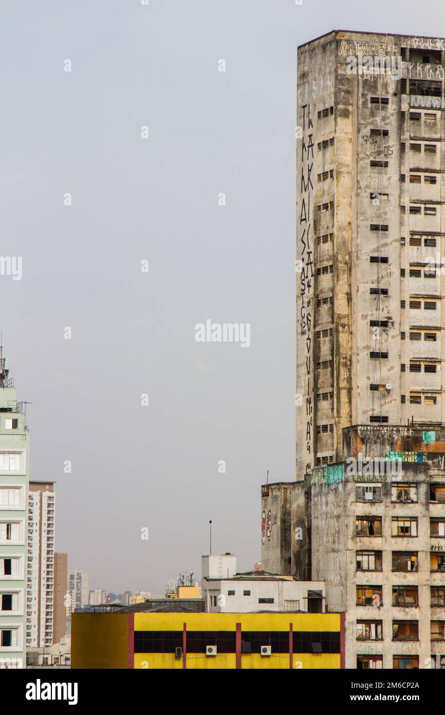 Invaded ruined buildings used as home by poor people Stock Photo - Alamy