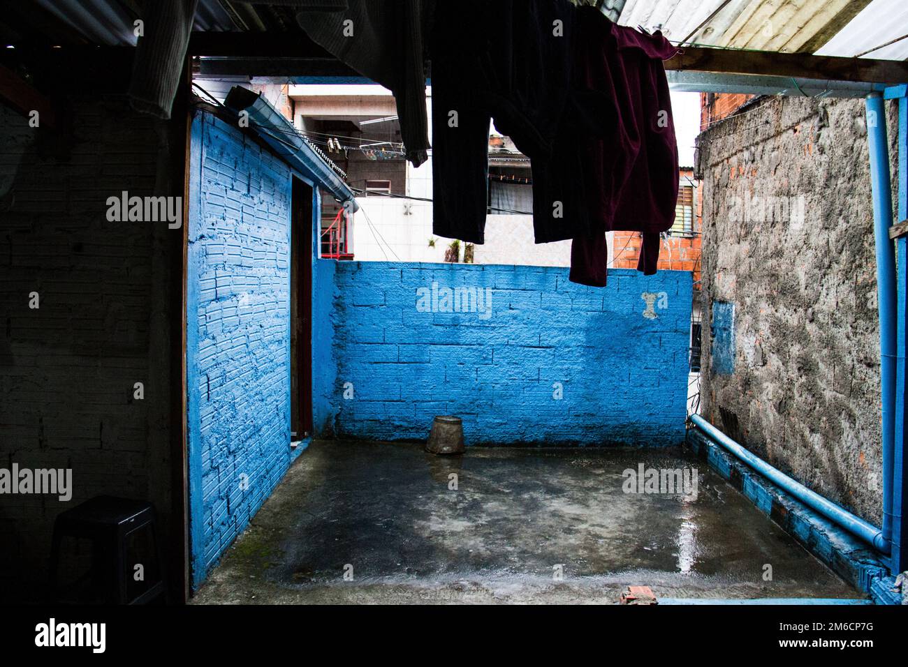 Terrace of a house in the slum with clothes hanging to dry Stock Photo ...