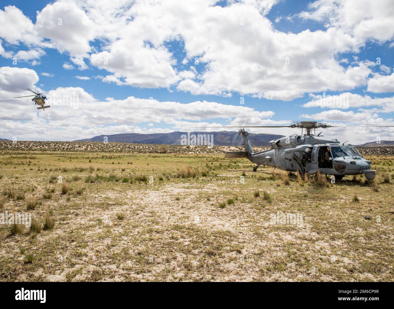 Two MH-60S Knighthawks, attached to Helicopter Sea combat Squadron (HSC ...