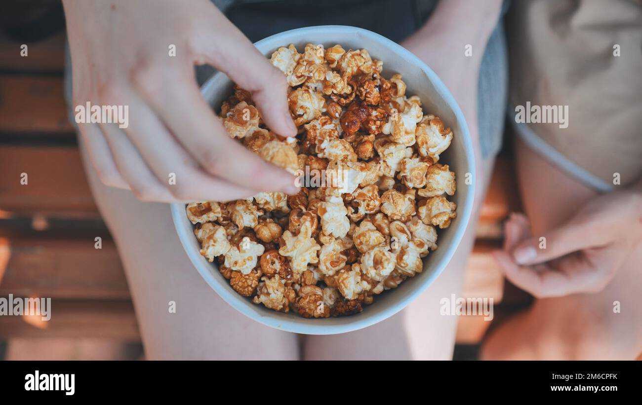 Popcorn with friends hi-res stock photography and images - Alamy