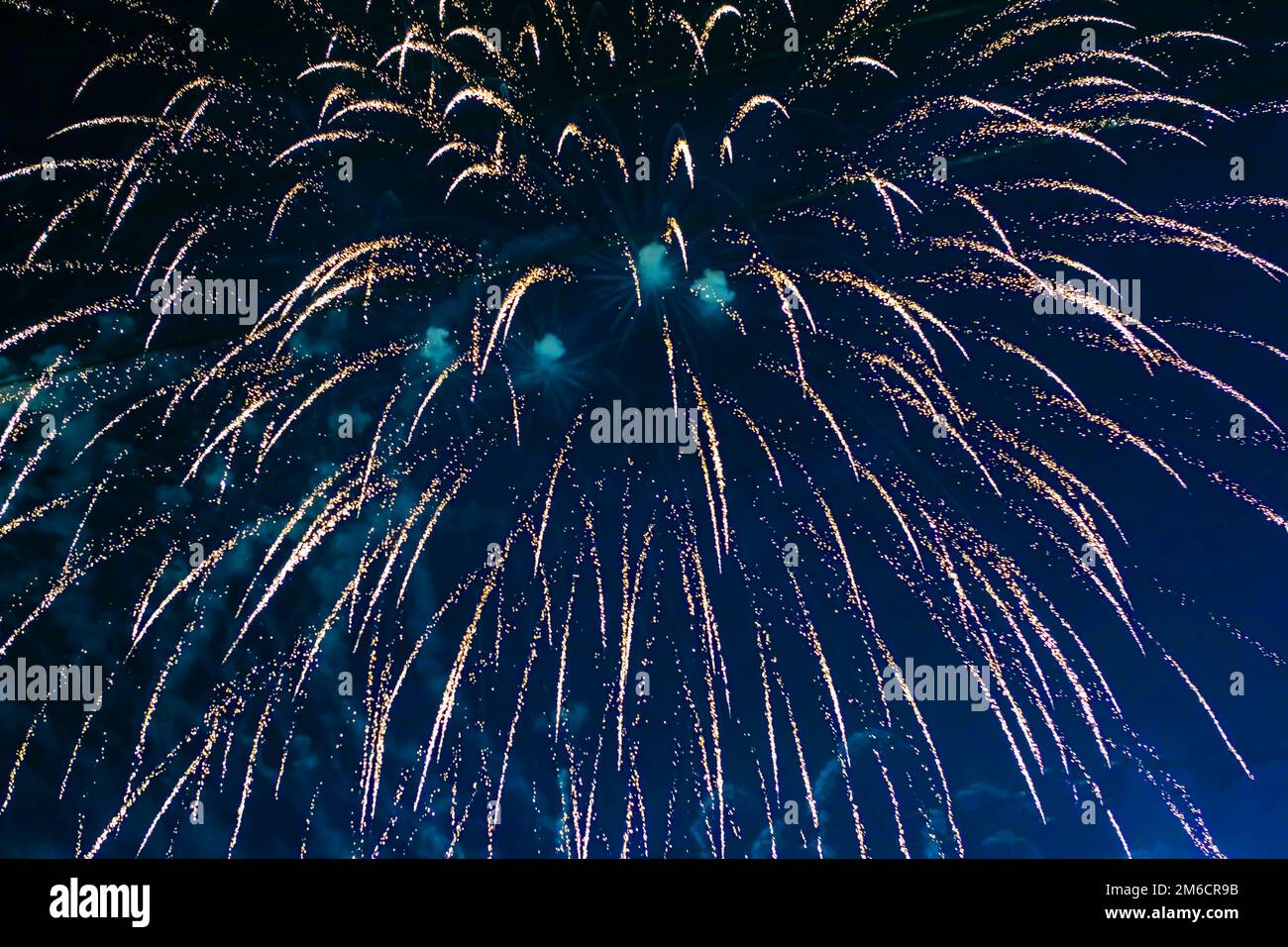 Bright, beautiful blue fireworks in the night sky. High quality photo ...