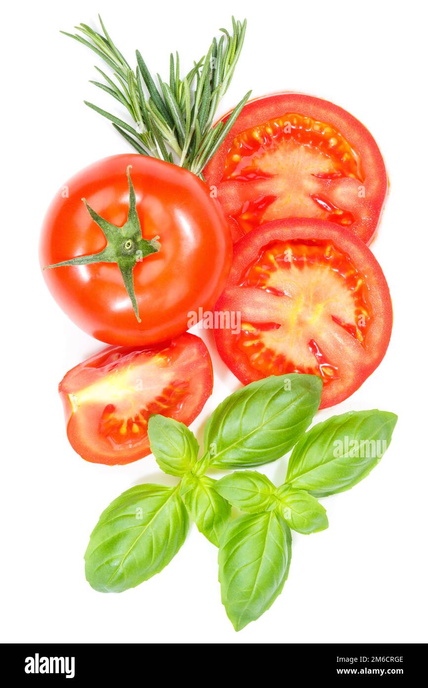 Tomatoes with basil vegetables from above portrait cropped crop ...