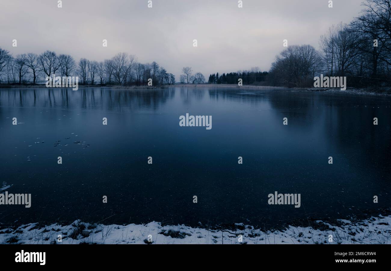 Frozen lake - winter landscape Stock Photo - Alamy