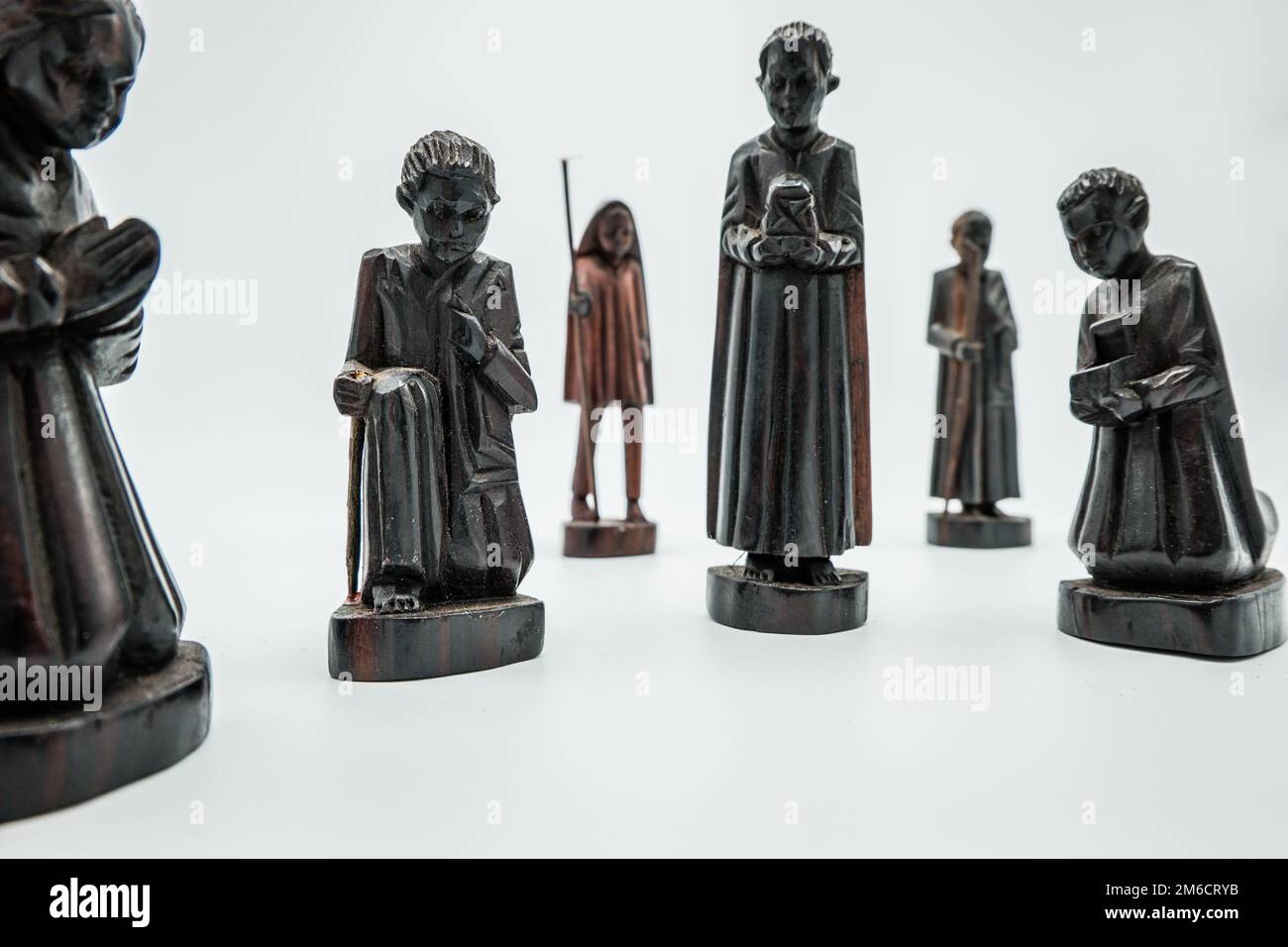 Three Magic Kings figures in dark wood isolated on white Stock Photo ...