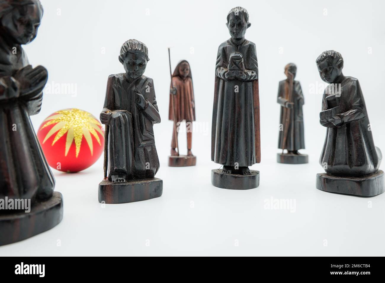 Biblical Magi with red and golden christmas ball Stock Photo - Alamy