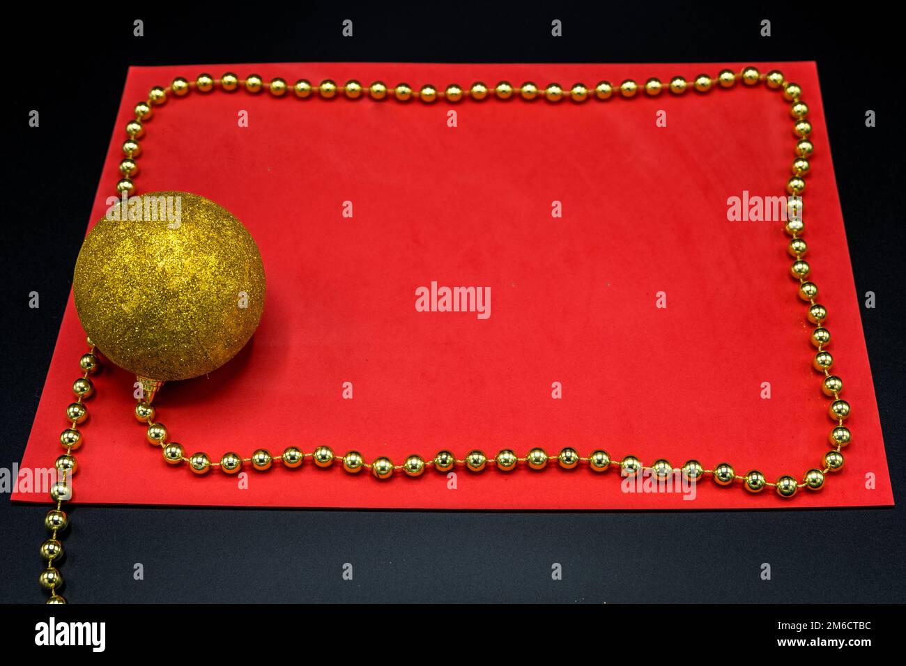 Red copy space with golden border and ball Stock Photo - Alamy