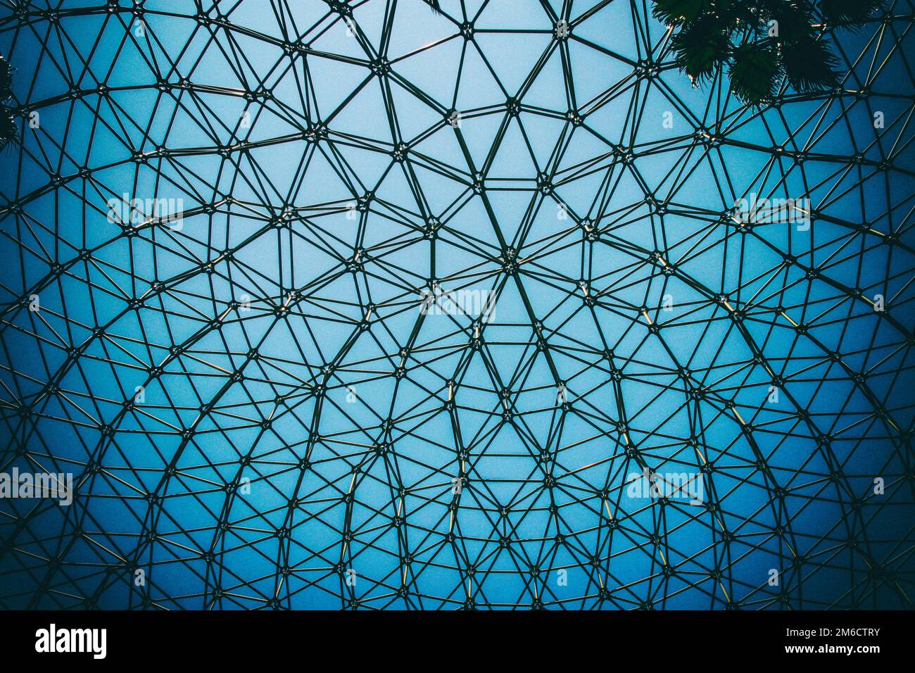 Curved ceiling of dome steel structure with blue sky background Stock ...