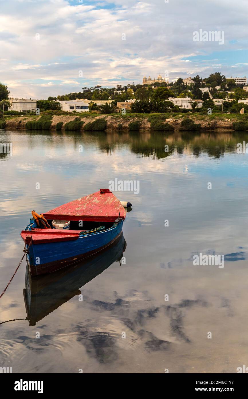 Small fishing boat at the ancient punic port in Carthage, Tunisia Stock ...
