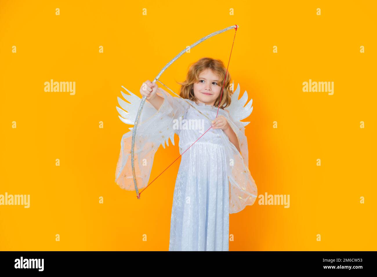 Angel child shoots a love arrow from a bow on Valentines Day. Cute ...