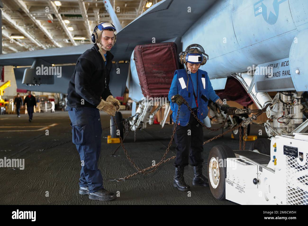 Aviation Boatswain's Mate (Handling) Airman Austin Parks, left, from ...