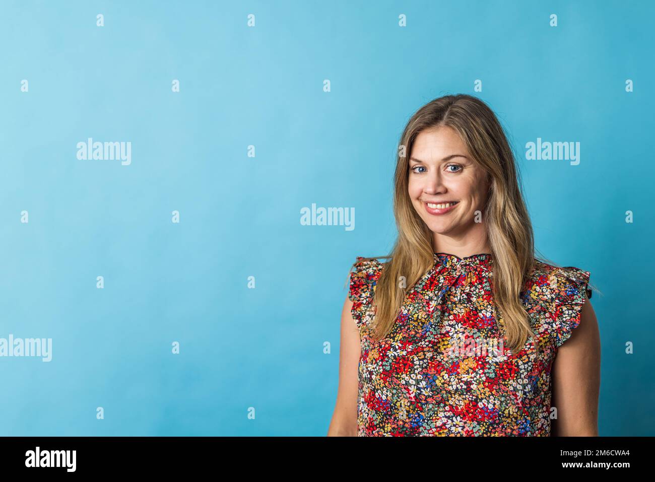 Beautiful woman in blue top hi-res stock photography and images - Alamy