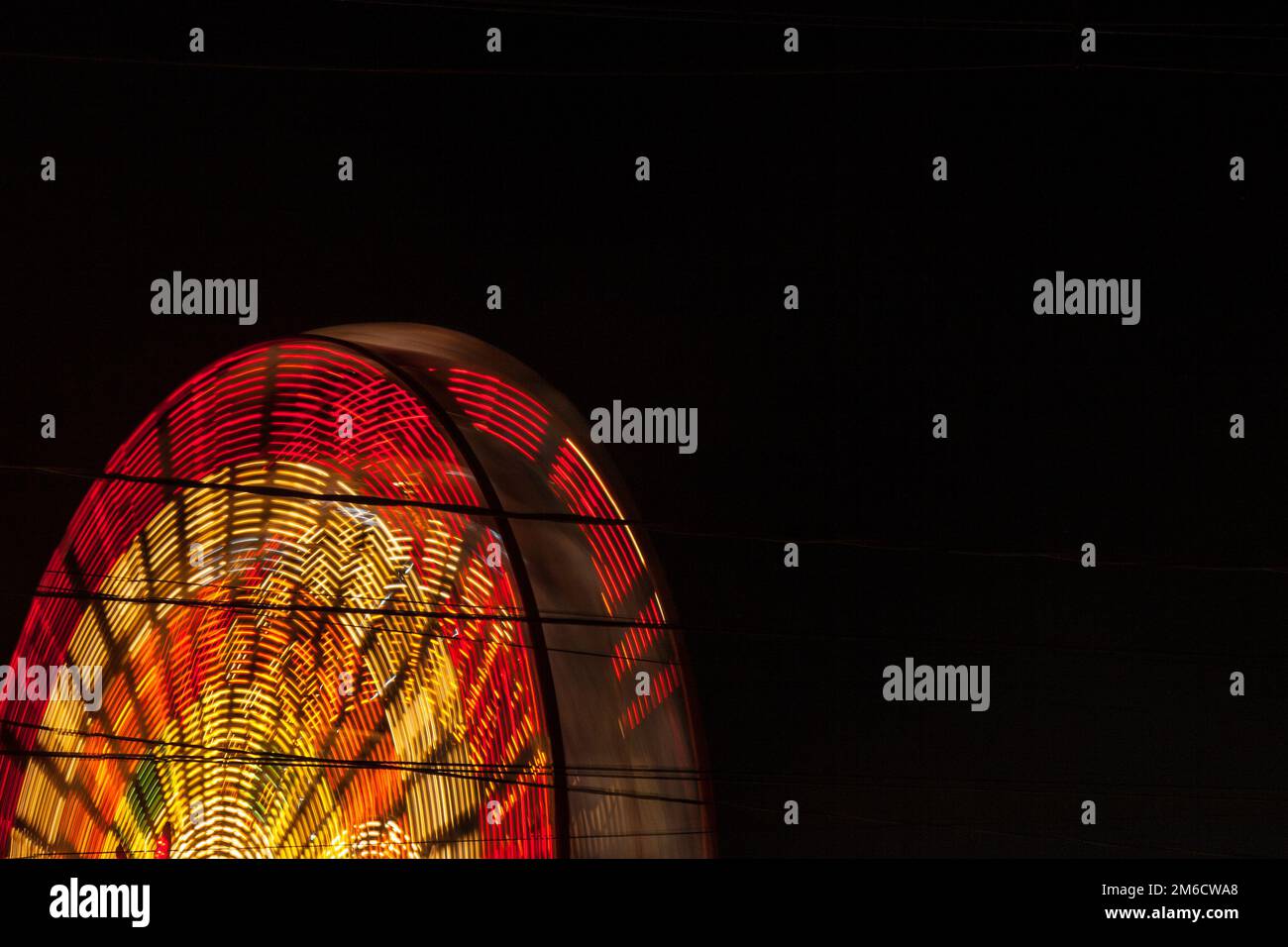 Spinning giant wheel Stock Photo - Alamy