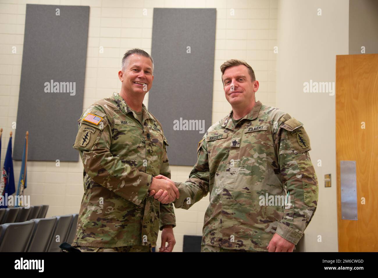 U.S. Army Command Sgt. Maj. Kenneth Huff shakes hands with U.S. Air ...