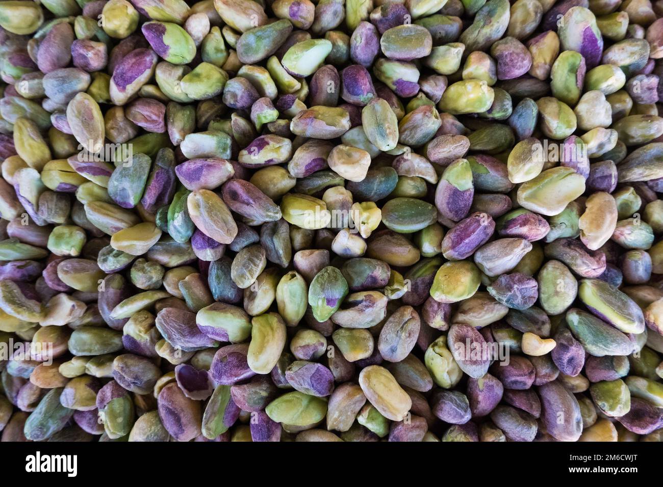 Pistachios texture background Stock Photo - Alamy