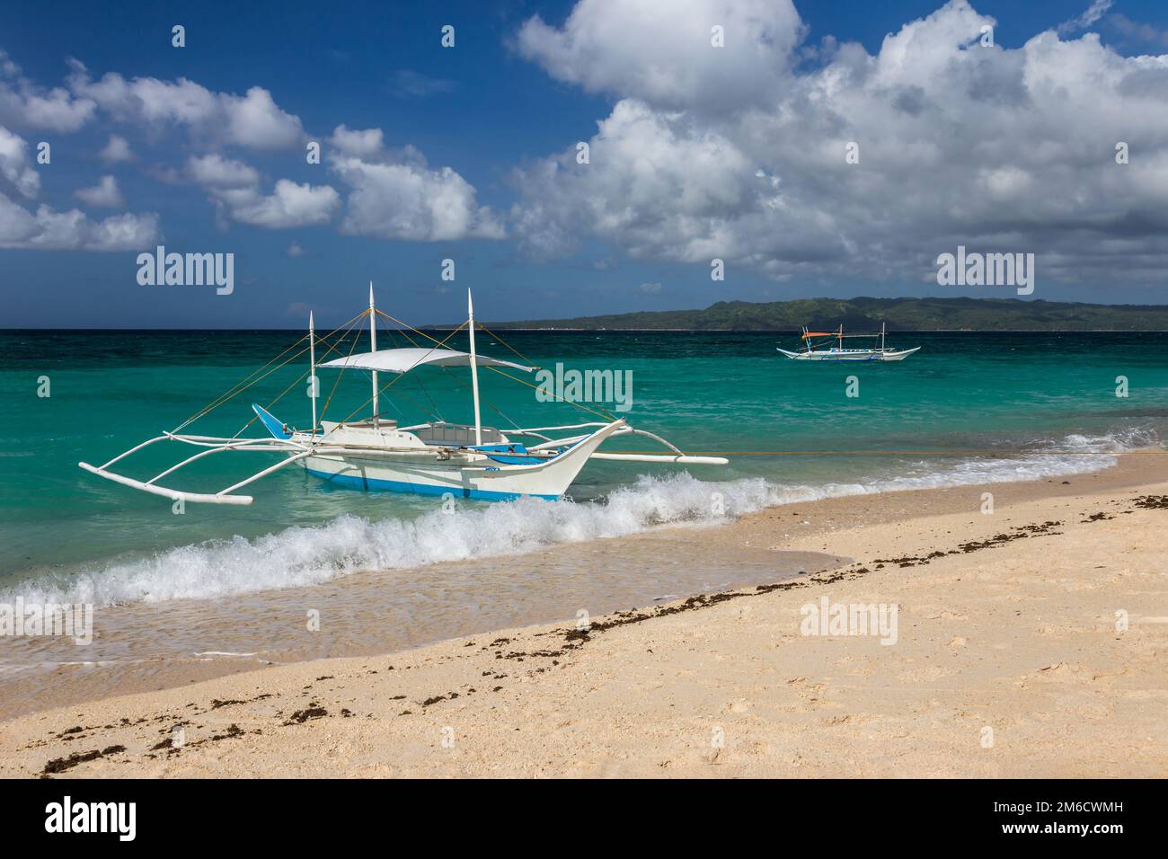 Traditional Philippine double-outrigger boat, known as bangka, banca ...