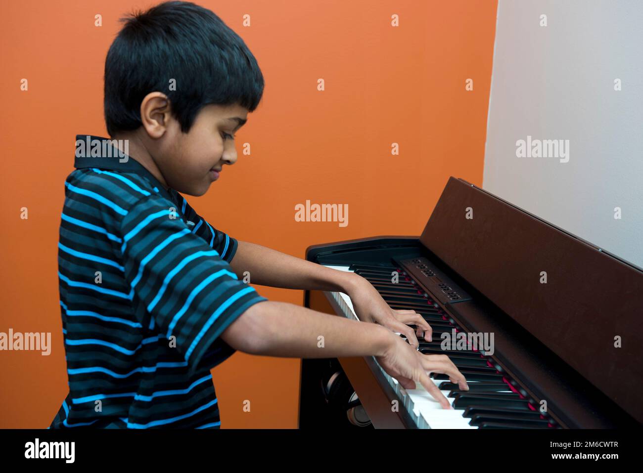 Kid Playing Keyboard