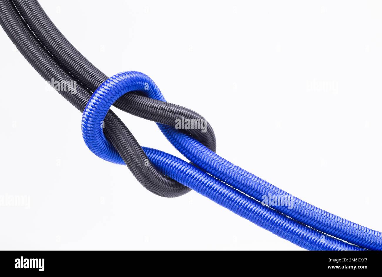 Blue and black string knotted on a white background Stock Photo - Alamy