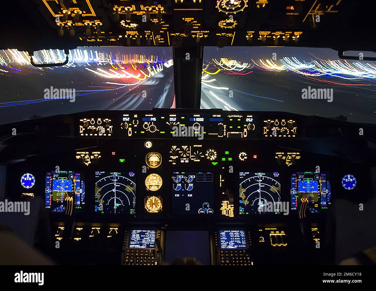 Cockpit of a passenger plane. View from the cockpit during Stock Photo ...