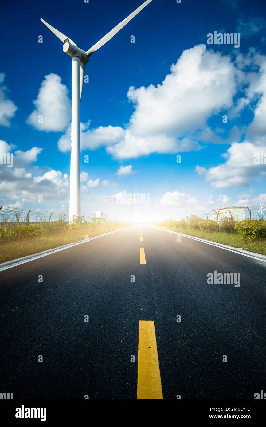 Empty road and wind turbine hi-res stock photography and images - Alamy