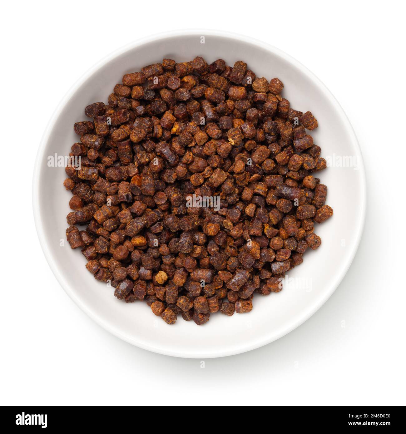 Bee Pollen Propolis In White Bowl Isolated Stock Photo - Alamy