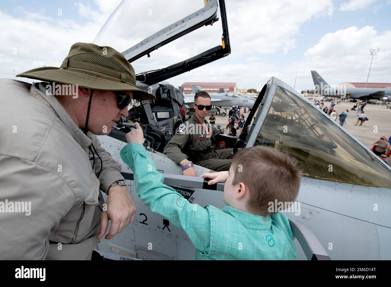 Garrett Smith, right, and his father Daniel Smith, left, get ...