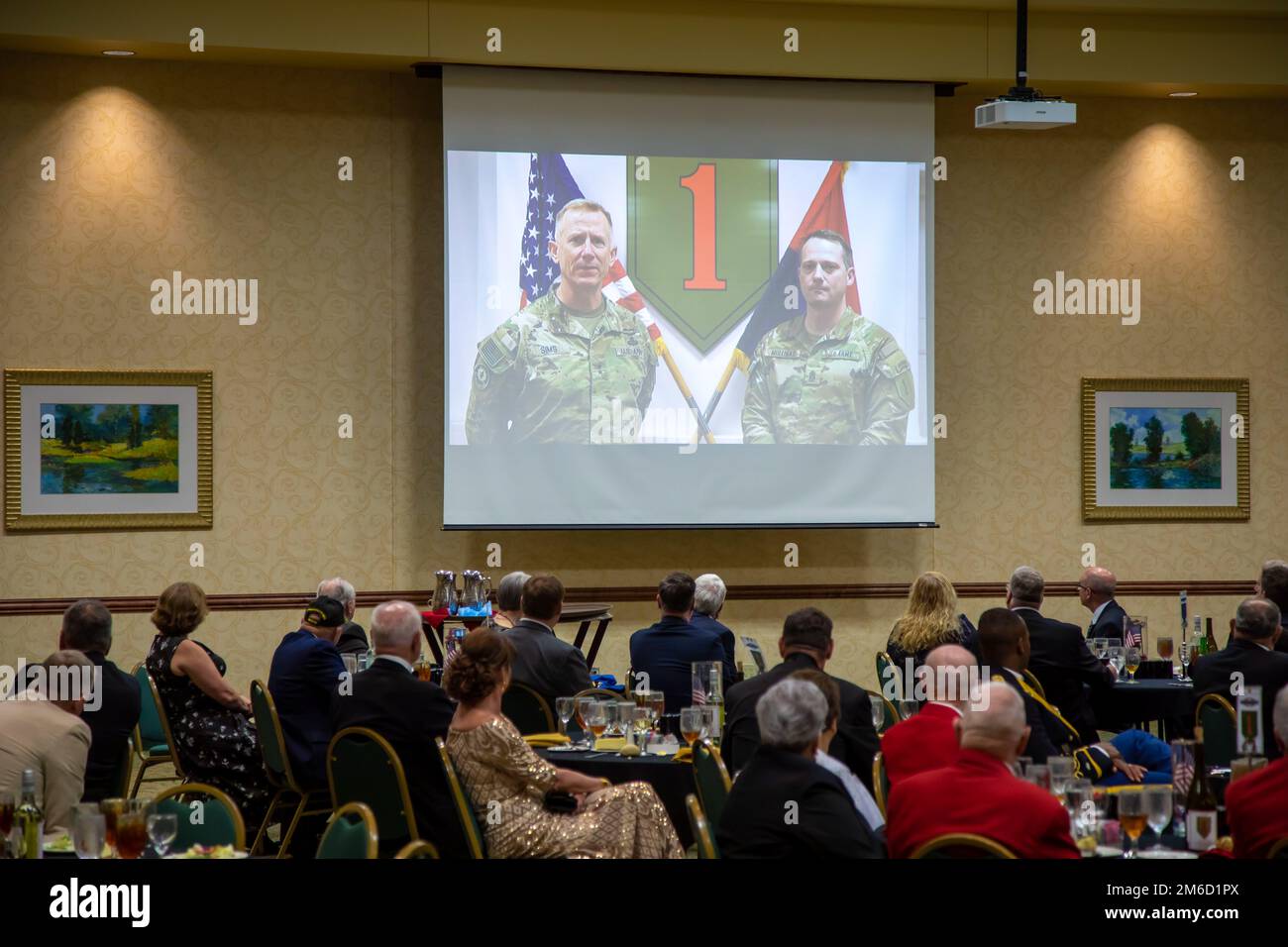 Former and current 1st Infantry Division Officers view a presentation ...