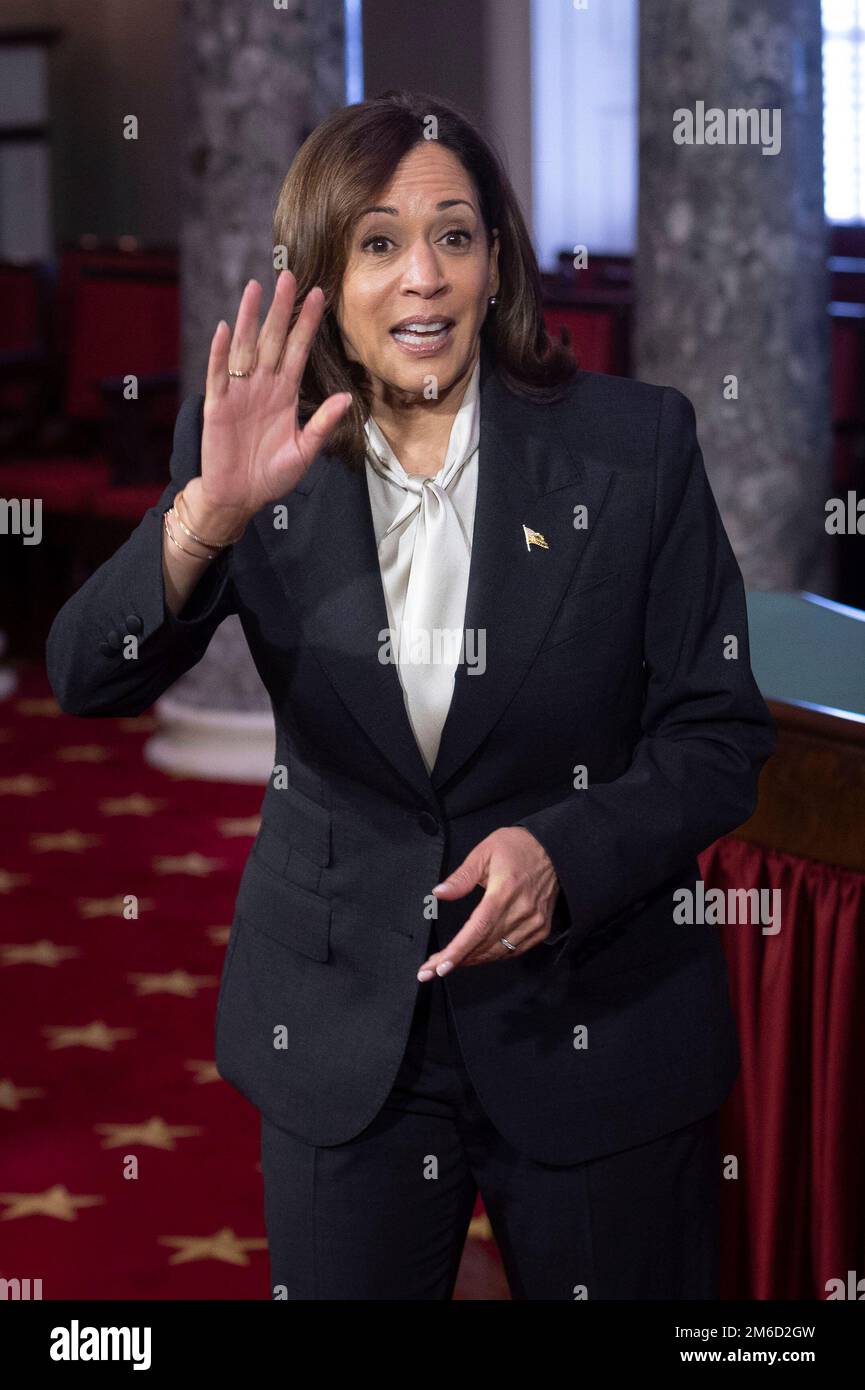 United States Vice President Kamala Harris waves to photographers at ...