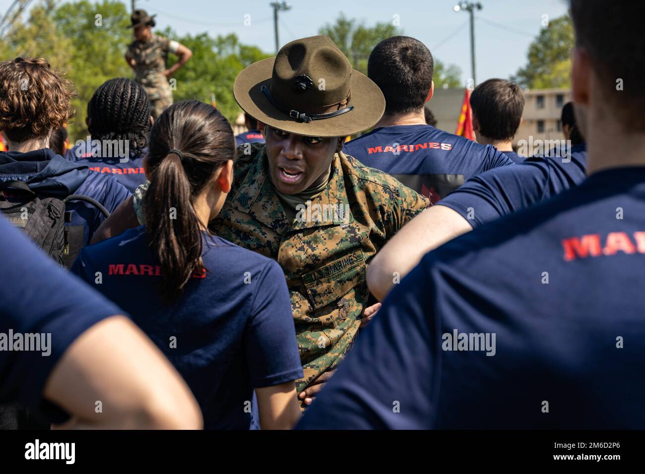 A U.S. Marine Corps drill instructor gives commands to a Poolee with Recruiting Station Richmond ...