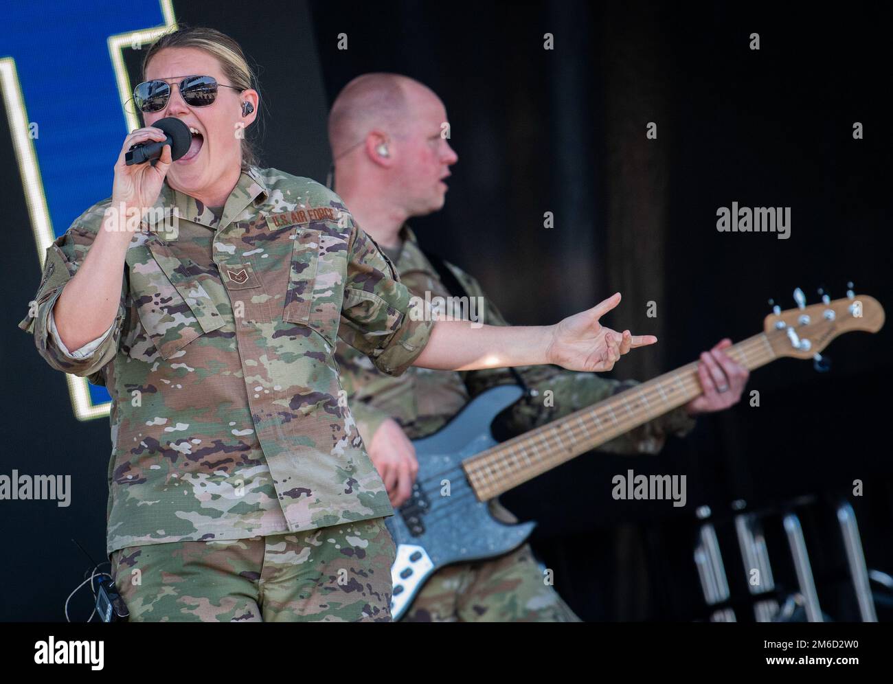 Tech. Sgt. Nadia Sosnoski sings out during the Air Force rock band Max ...