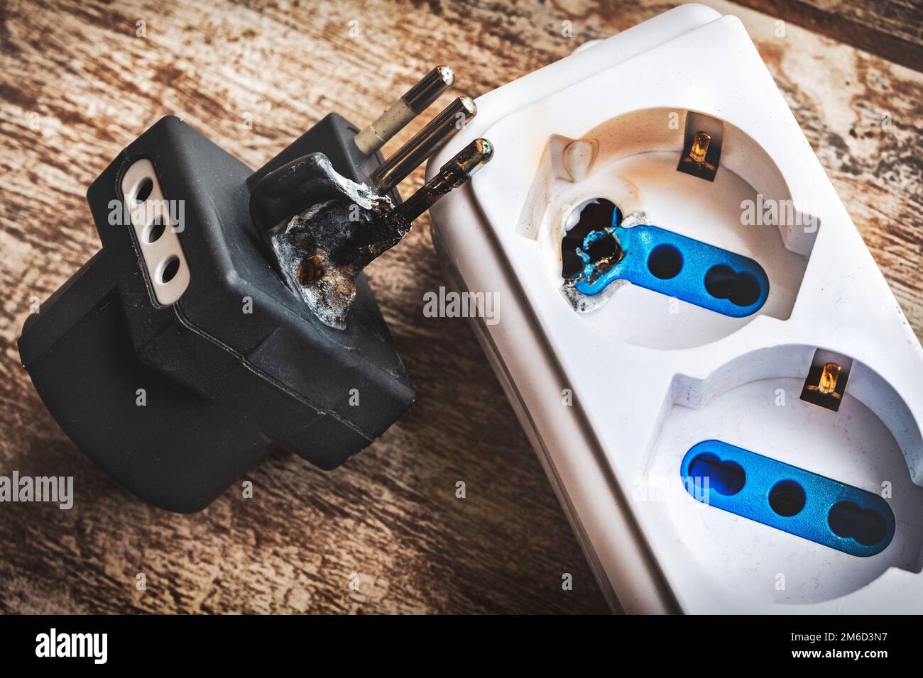 Power strip electrocution burnt danger vintage background Stock Photo ...