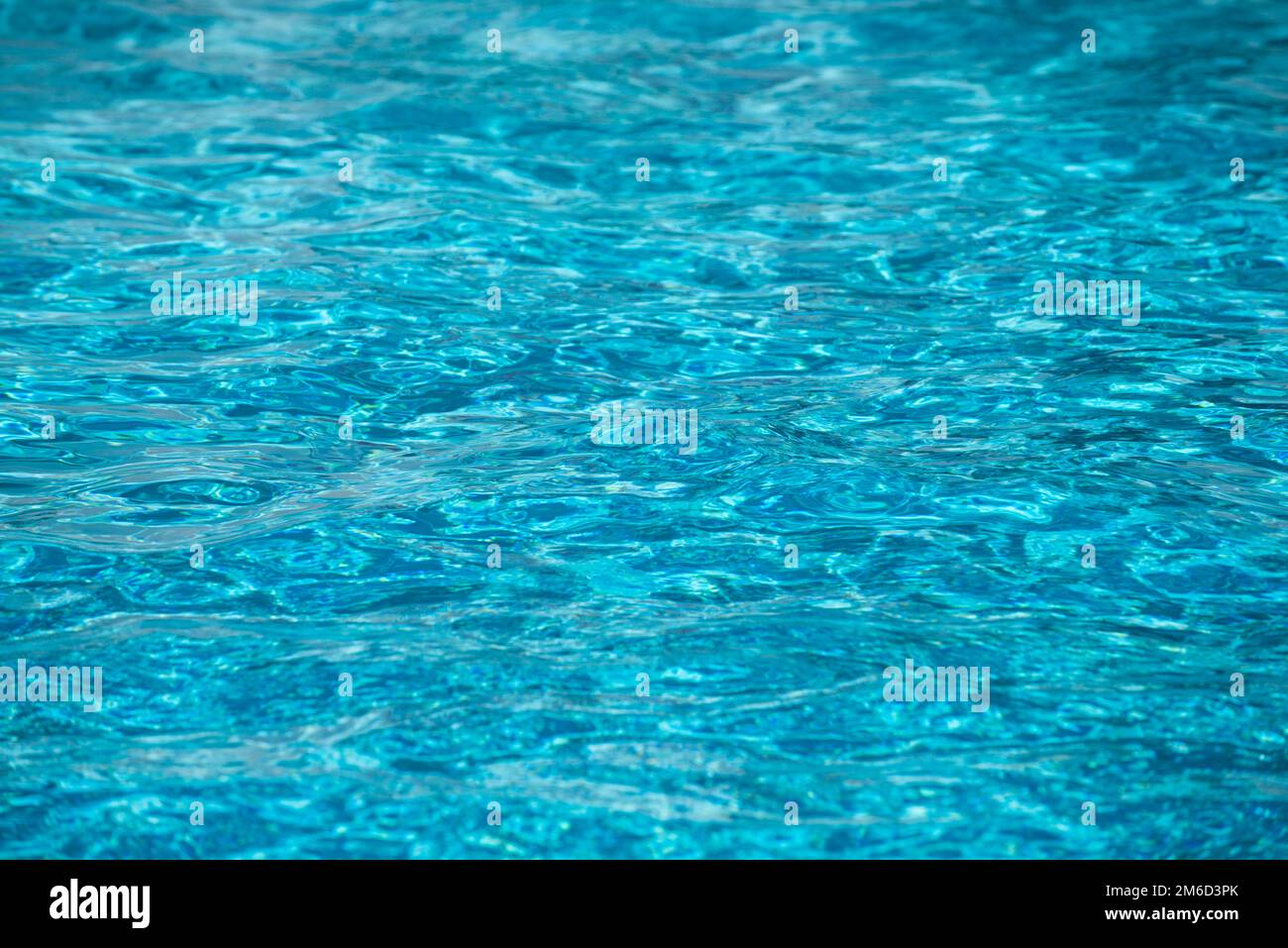 Background of blue water in swimming pool with sun reflection, ripple ...