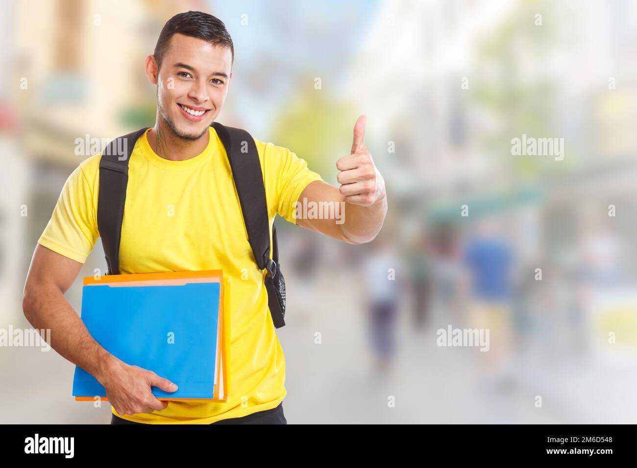 Student success successful thumbs up smiling people town copyspace copy ...