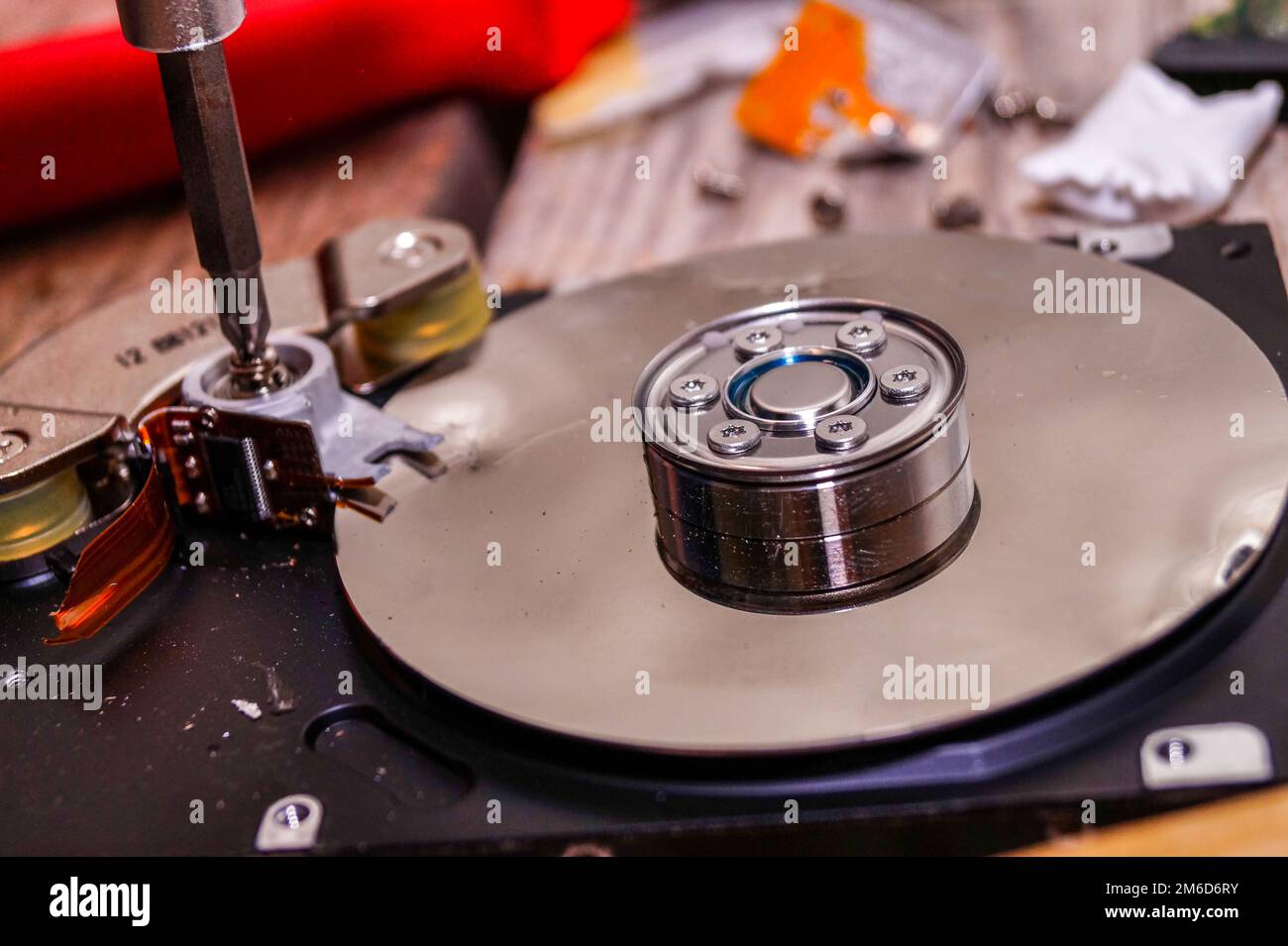 A man breaks a computer using locksmith tools Stock Photo - Alamy