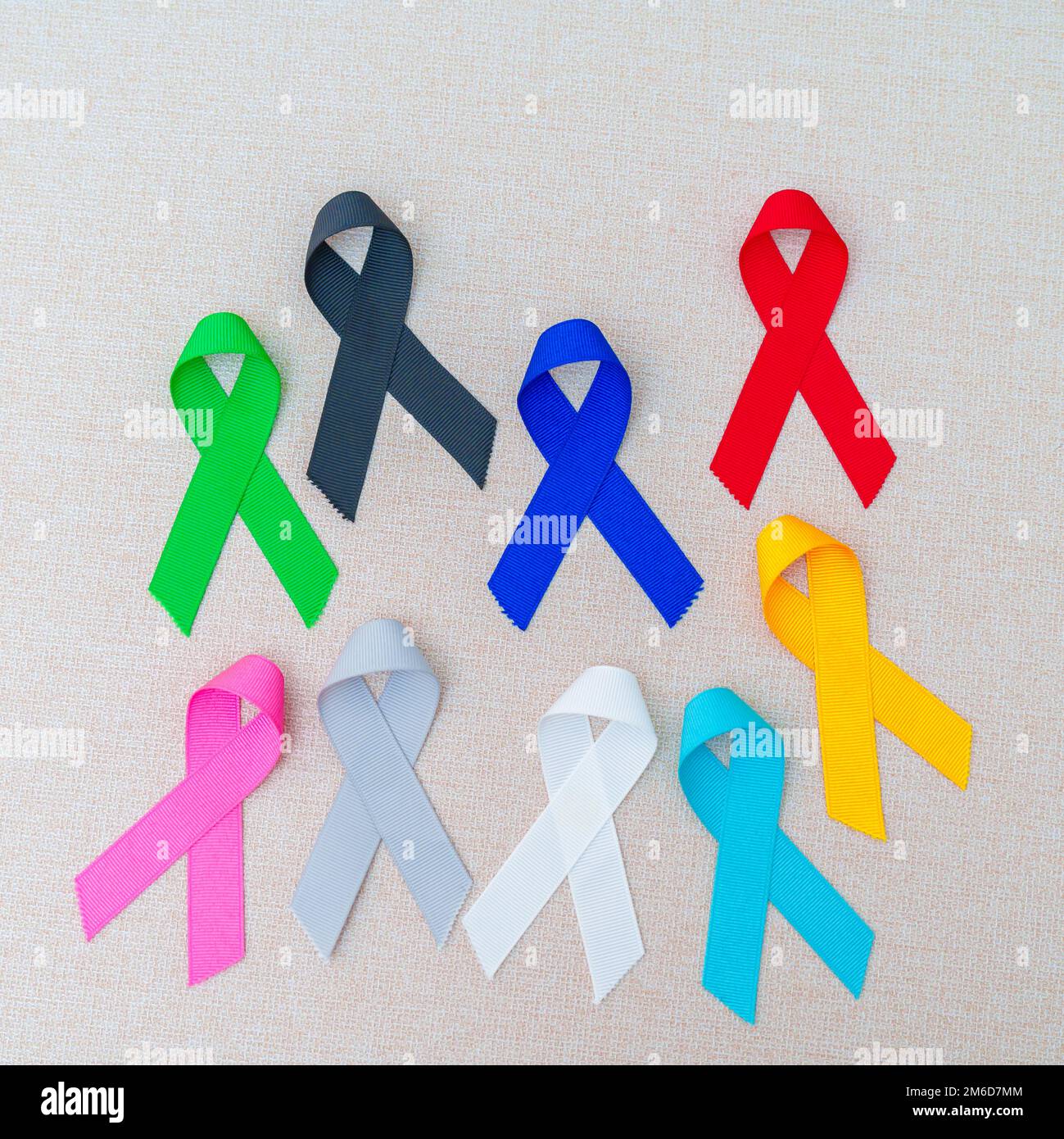 World cancer day, February 4. Colorful ribbons for supporting people ...